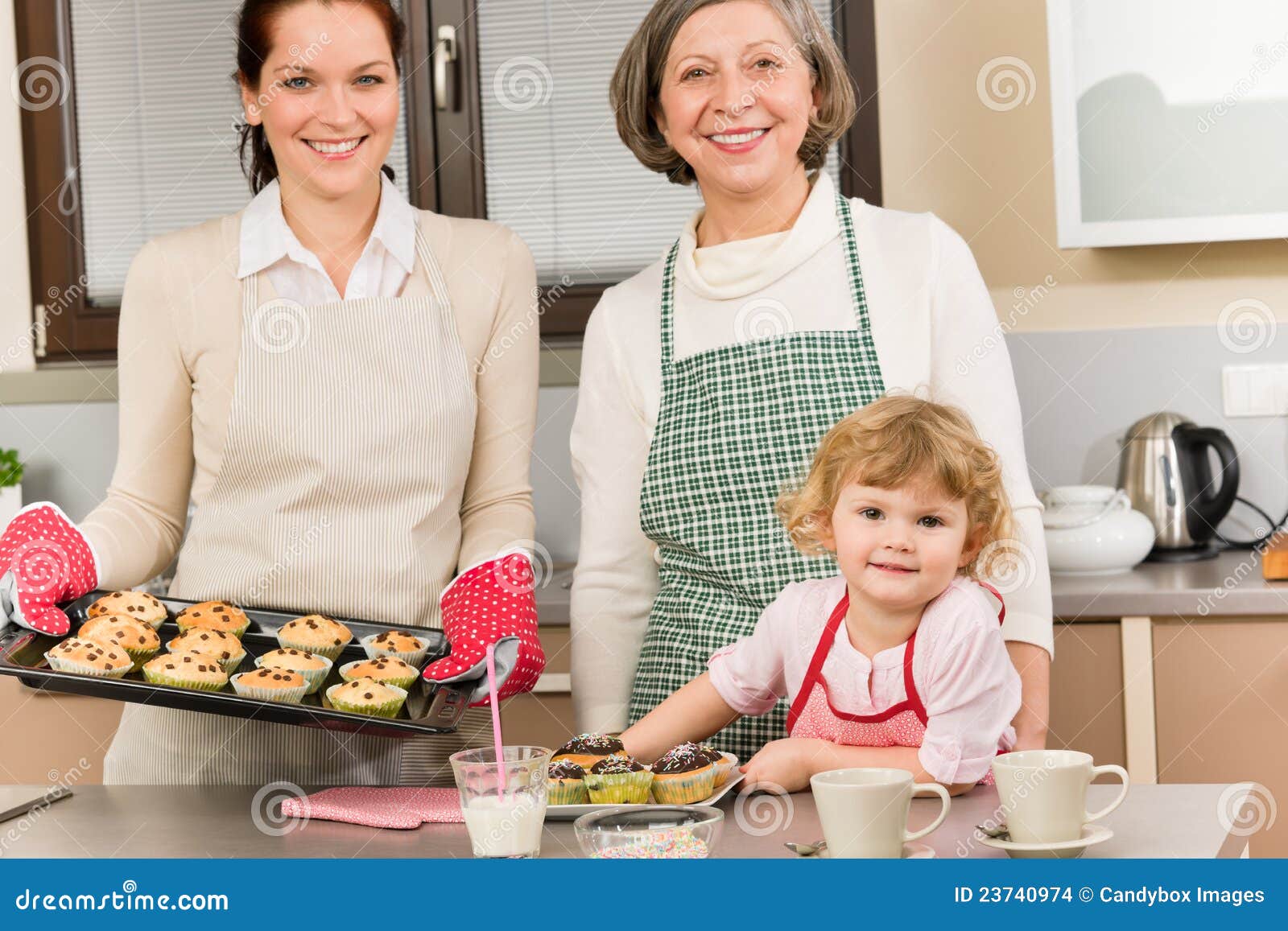 Three Generations of Women Baking in Kitchen Stock Photo - Image of ...