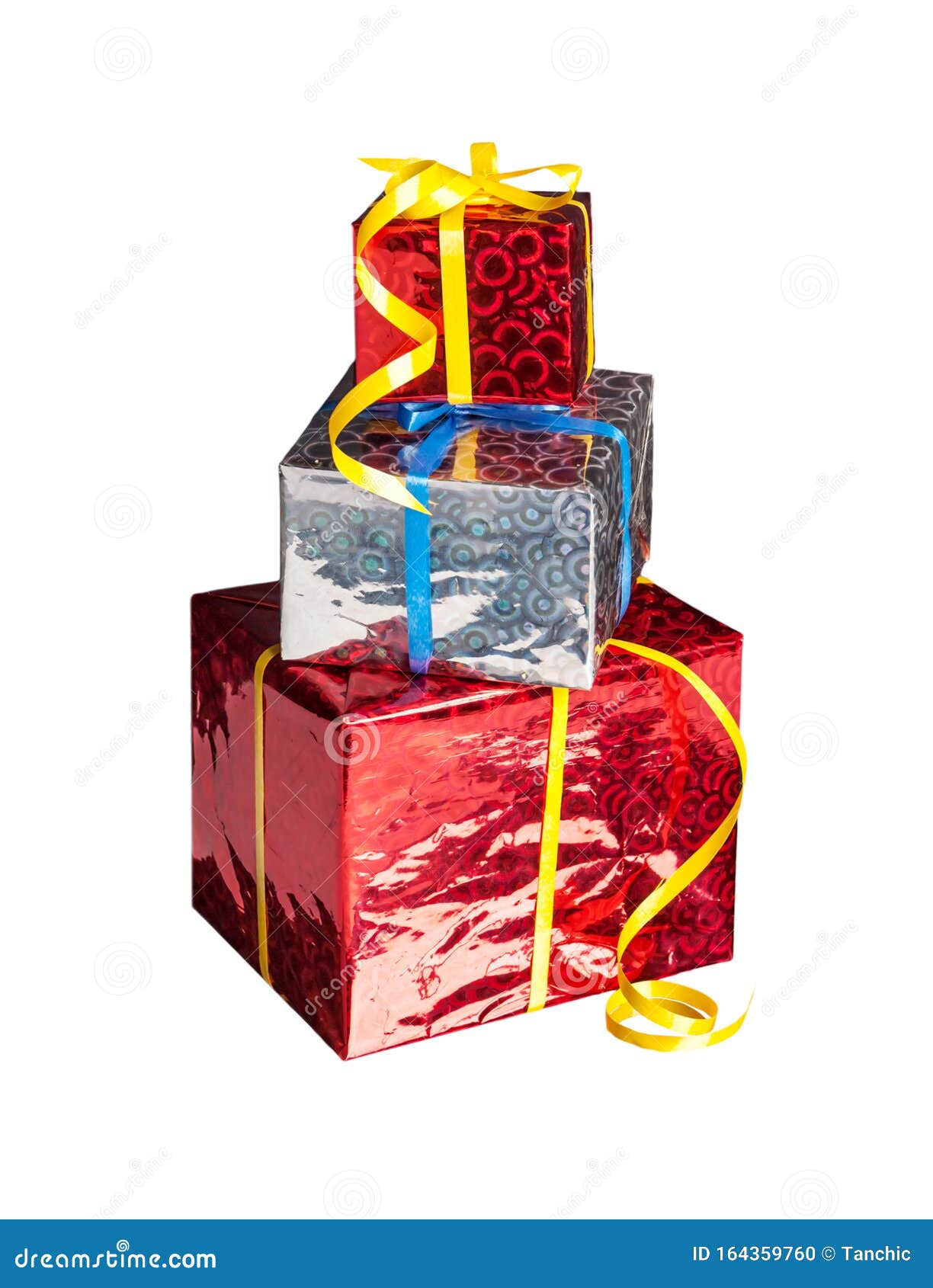 Three Gifts in Red and Silver Packaging Stand on Top of Each Other ...