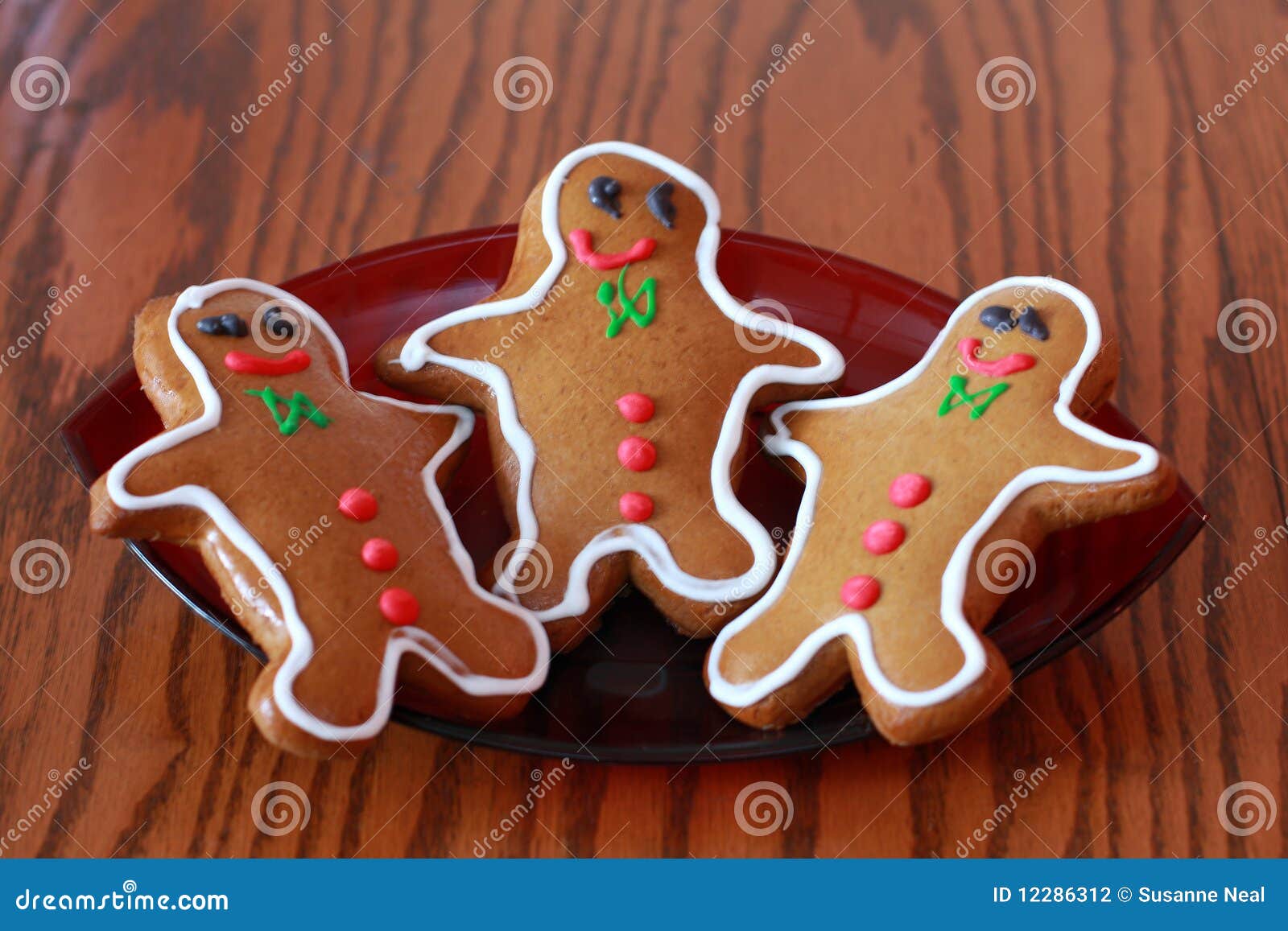 Three Gingerbread Boy Cookies Stock Photo - Image of fattening, blur ...