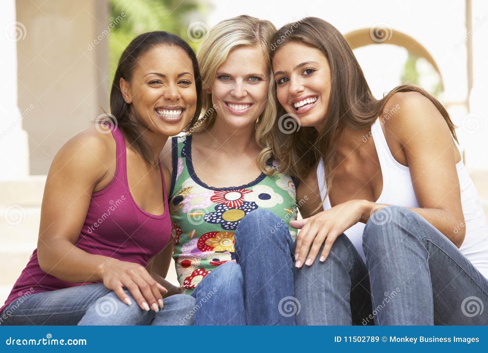Three Girlfriends Sitting on Steps of Building Stock Image - Image of ...