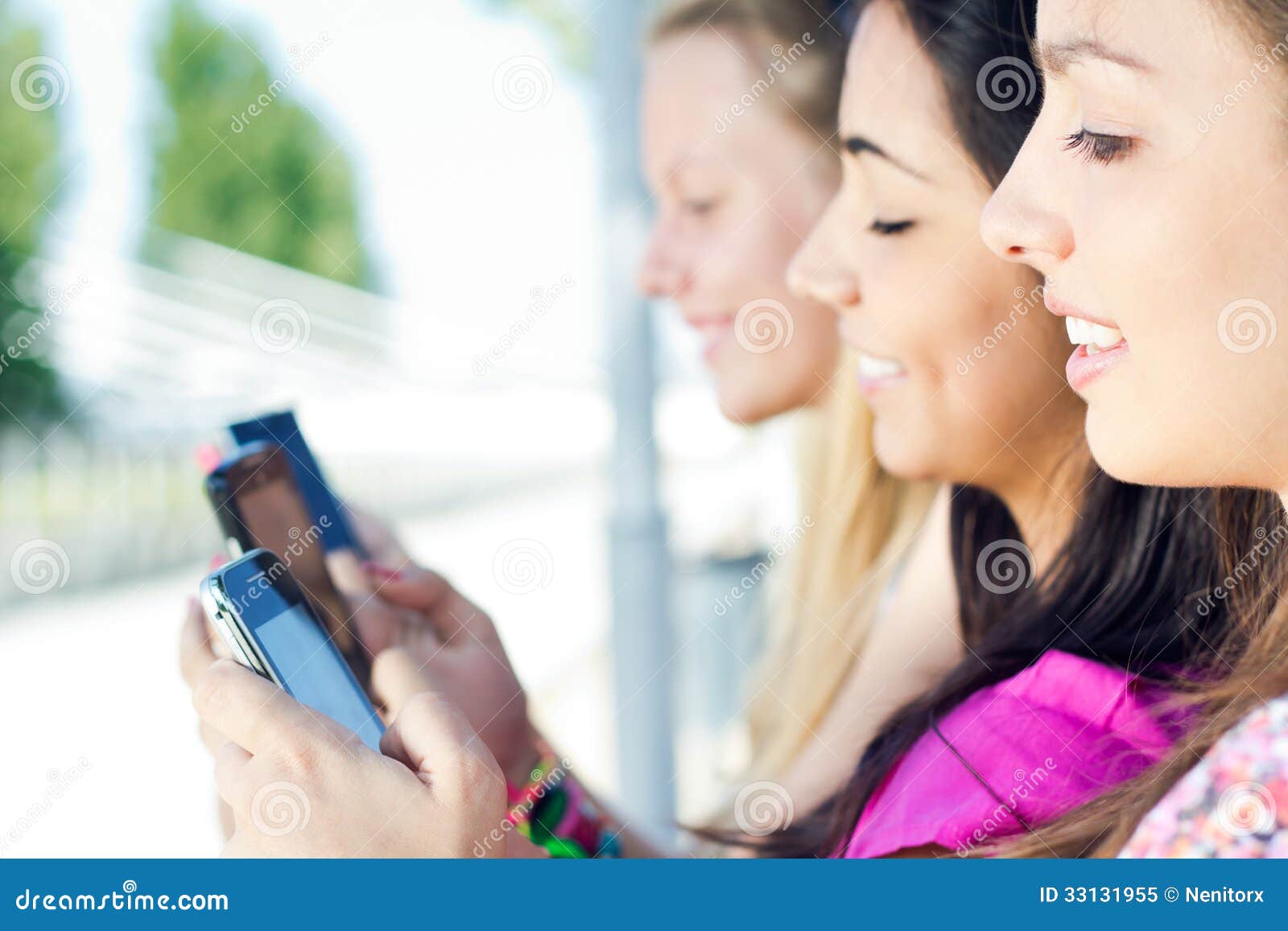 Three Girls Chatting with Their Smartphones Stock Image - Image of ...