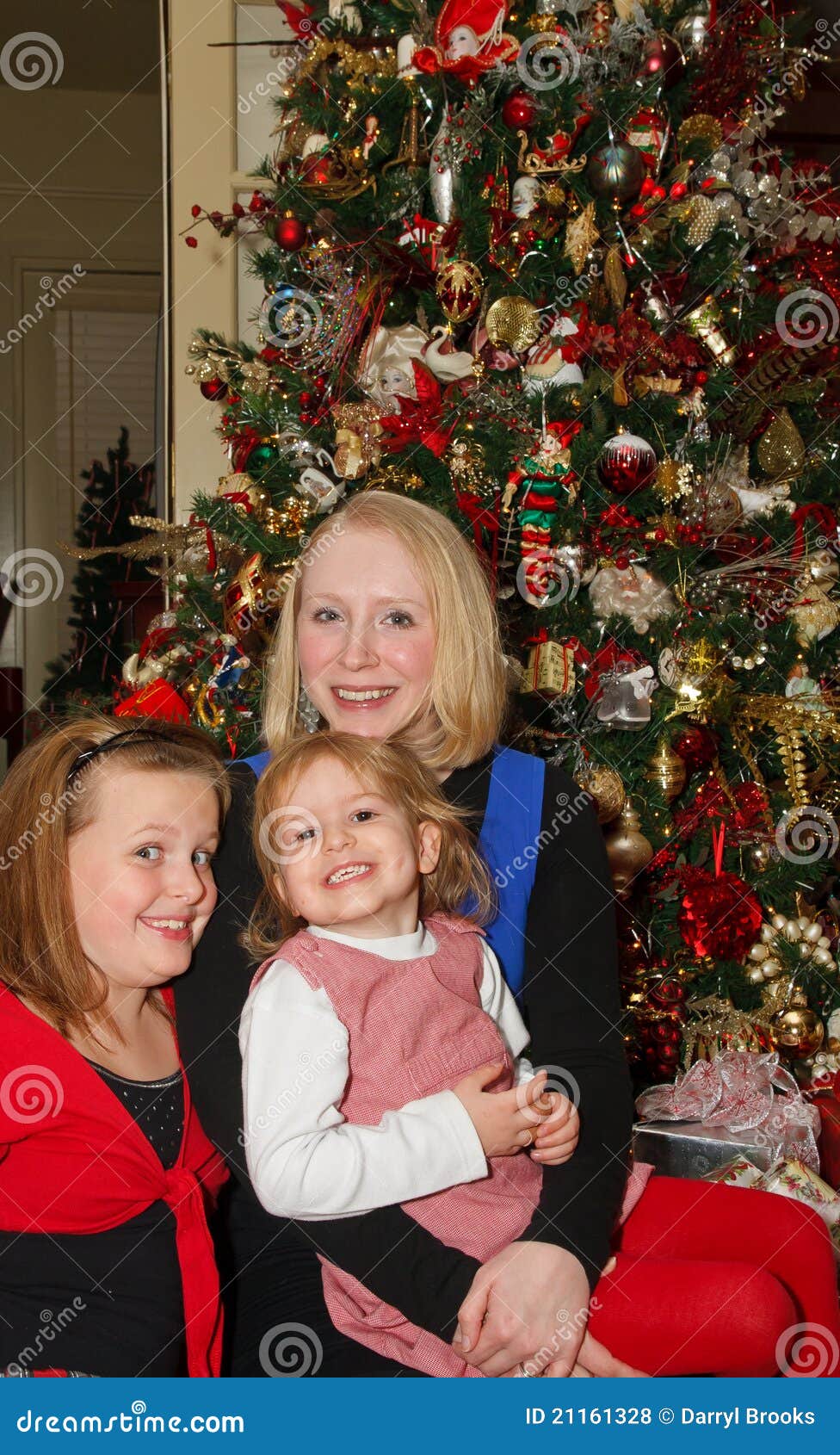 Three Girls at Christmas stock photo. Image of ribbon - 21161328