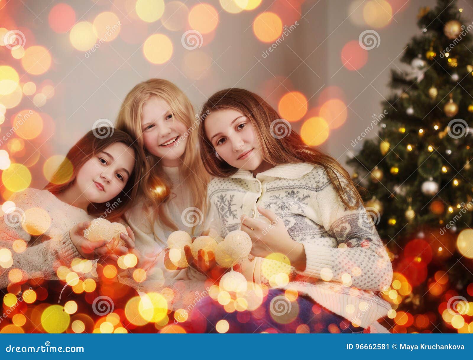 Three Girls at Christmas Tree Stock Image - Image of firtree, christmas ...