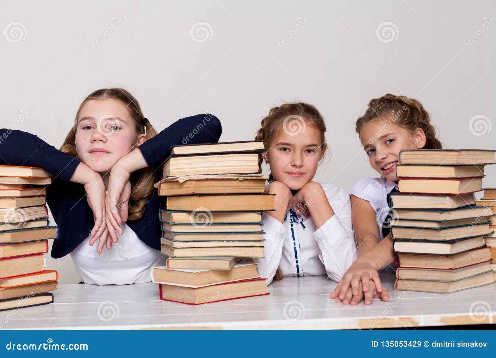 Three Girls in the Classroom Studying Many Books Stock Image - Image of ...