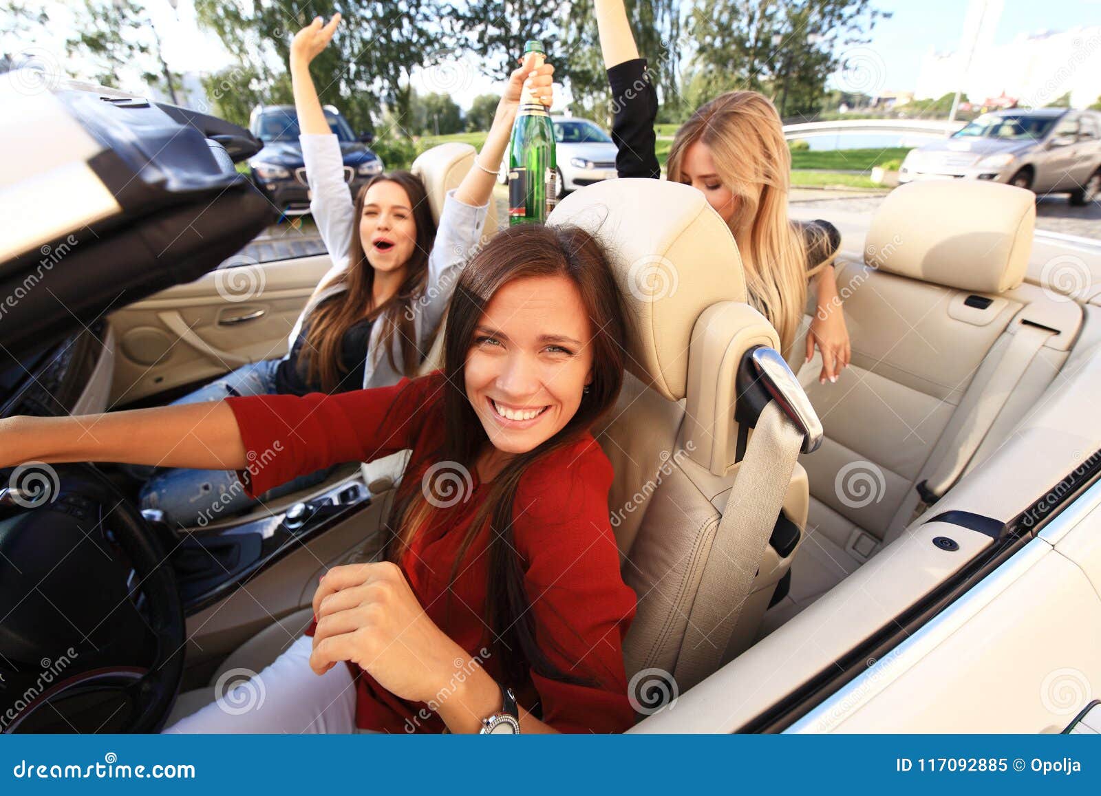 Three Girls Driving in a Convertible Car and Having Fun. Stock Image ...