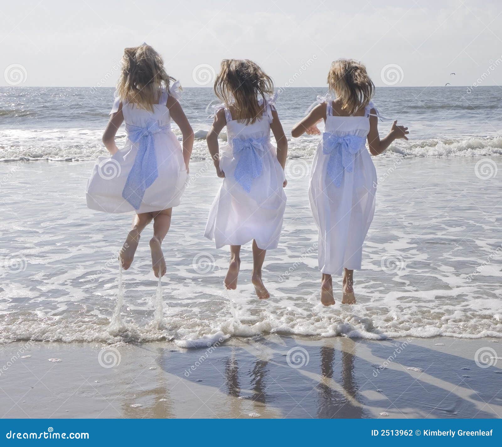 Three Girls Jumping stock photo. Image of three, beach - 2513962