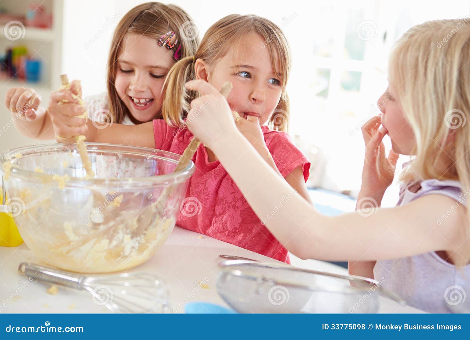Three Girls Making Cupcakes in Kitchen Stock Photo - Image of home ...