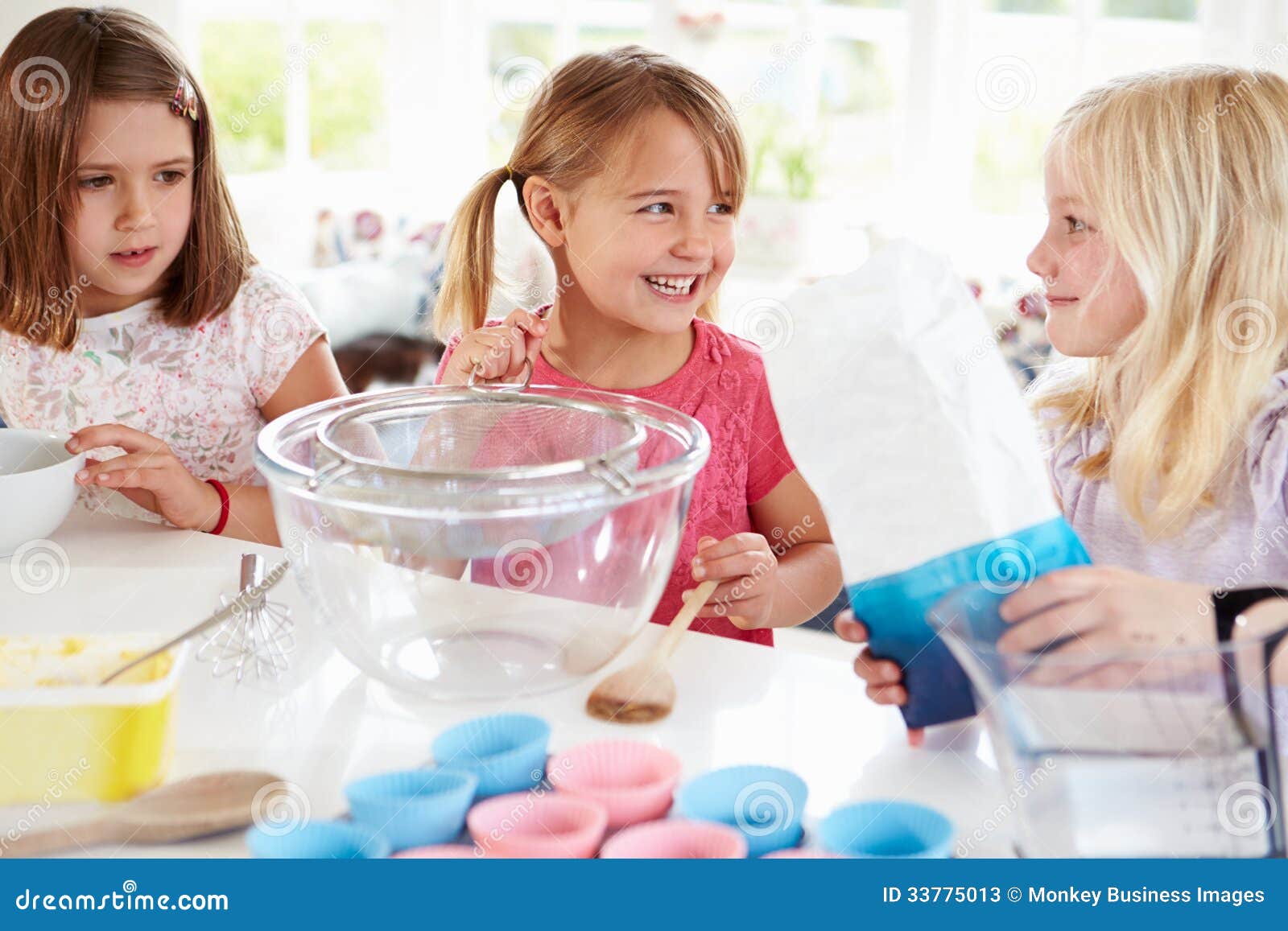 Three Girls Making Cupcakes in Kitchen Stock Image - Image of indoors ...