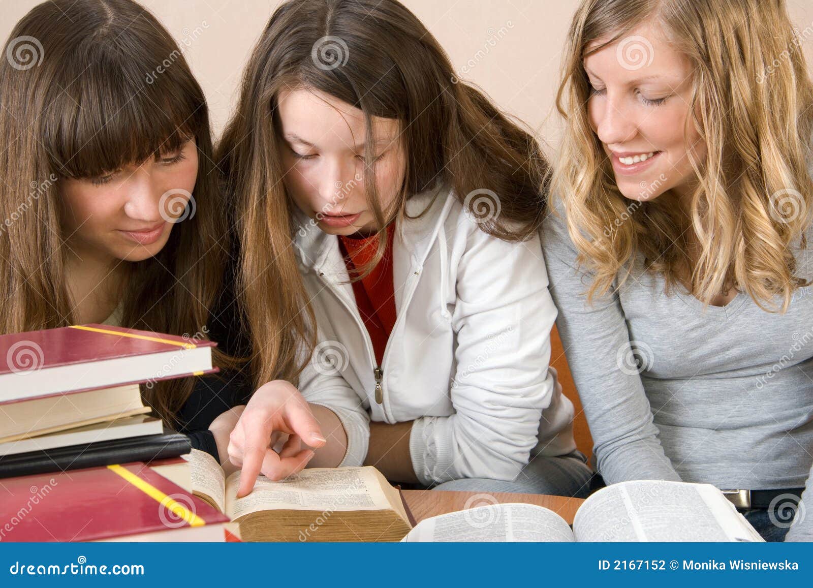 Three Girls Reading stock photo. Image of females, college - 2167152