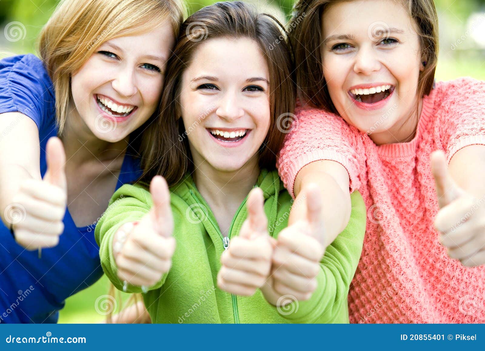 Three girls with thumbs up stock image. Image of smile - 20855401