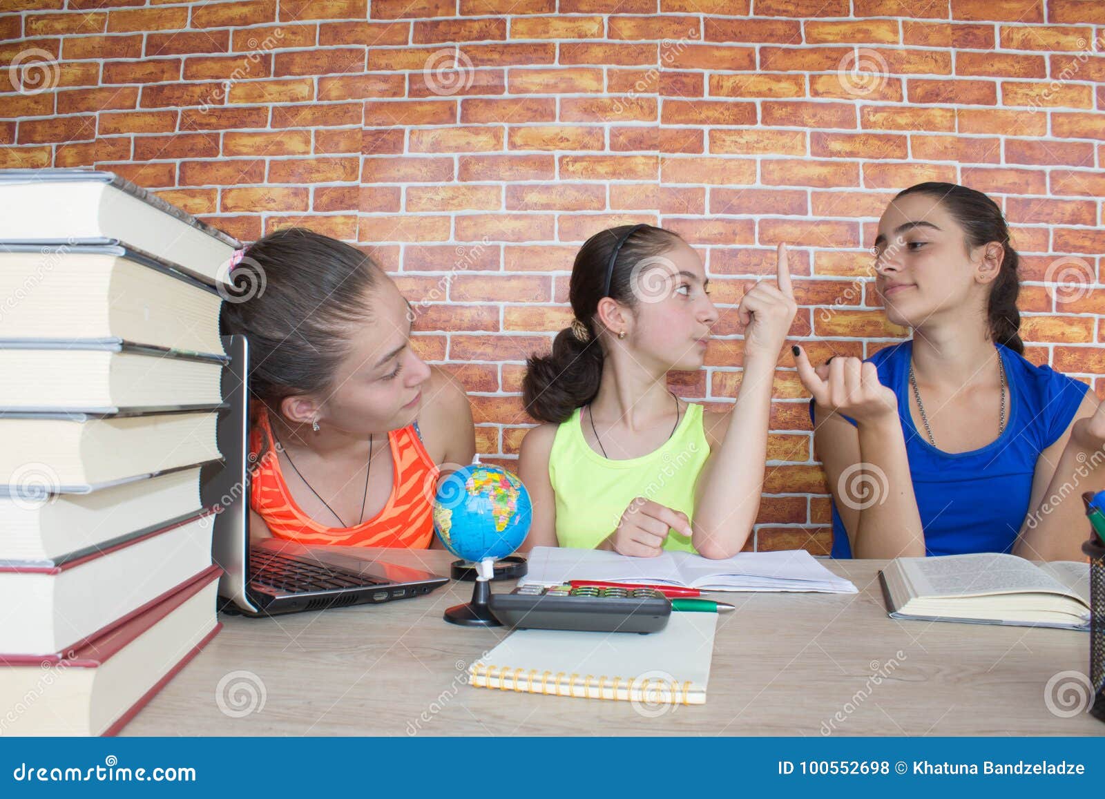 Three Girls Work on His Homework. Portrait of Three Girls School ...