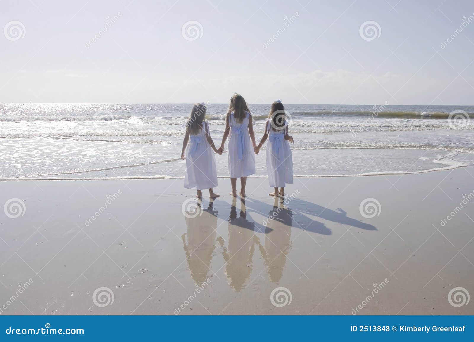 Three Girlss Holding Hands stock photo. Image of tropical - 2513848
