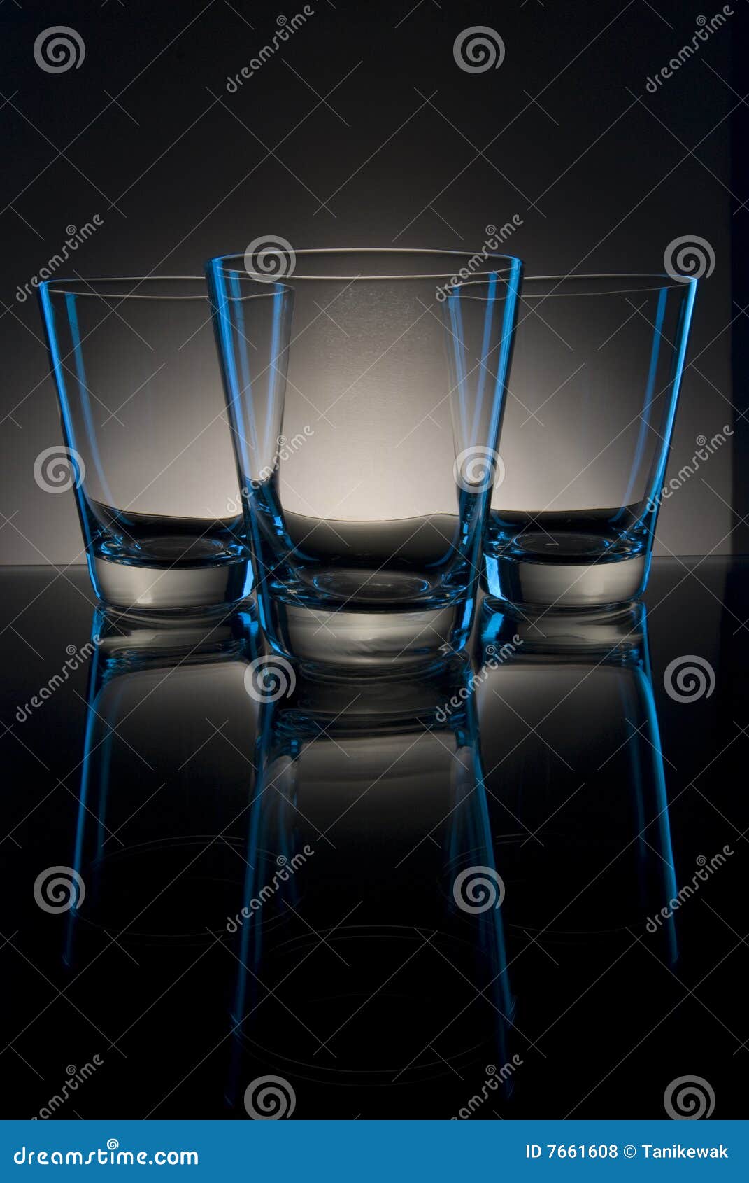 Three glasses stock photo. Image of blue, black, translucent - 7661608