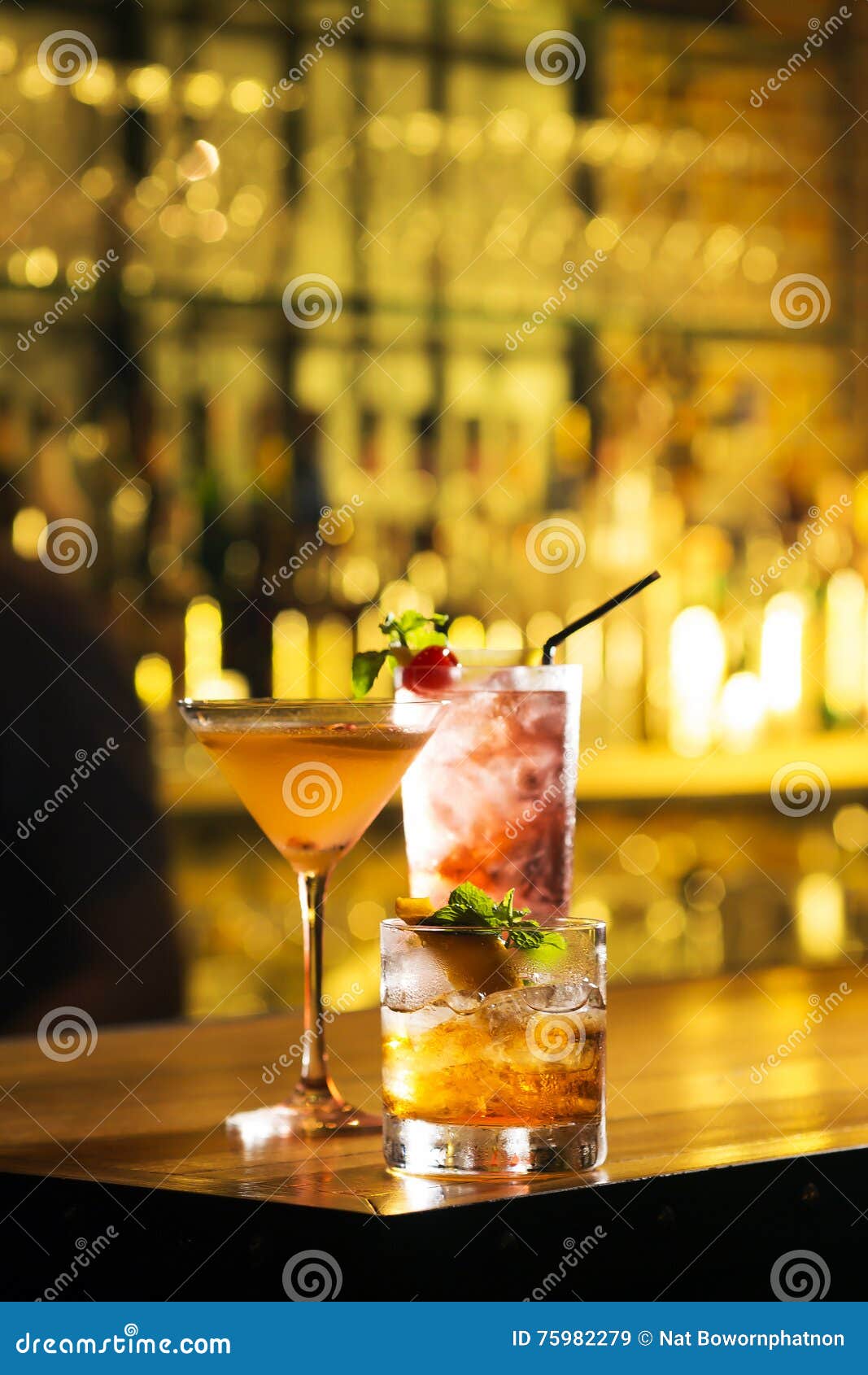 Three Glasses of Cocktail Serve on Bar Stock Image - Image of drinks ...