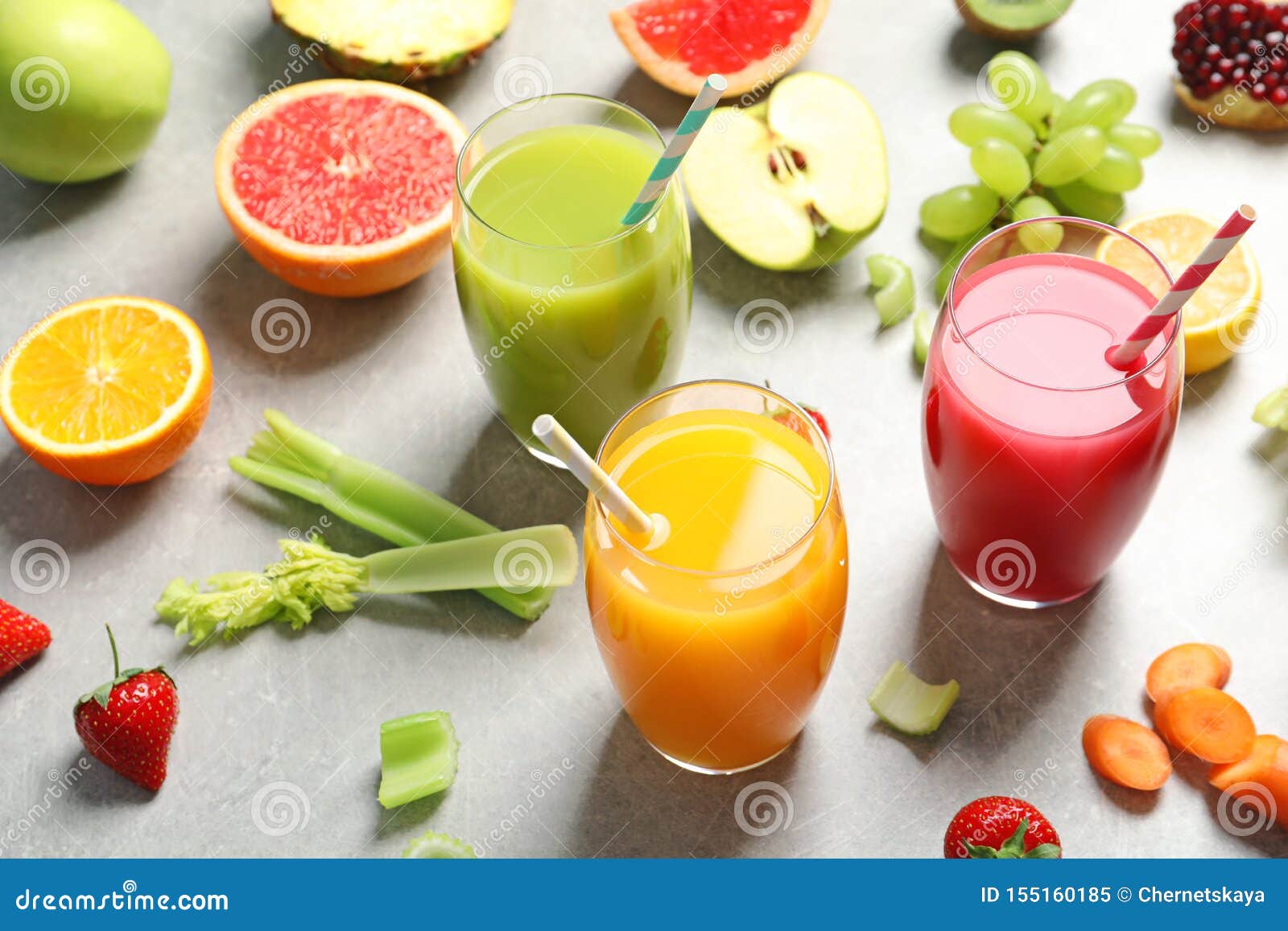 Three Glasses of Different Juices and Fresh Ingredients Stock Image ...