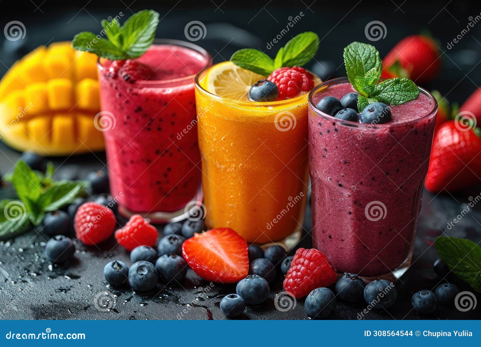 Three Glasses Filled with Various Fresh Fruit Smoothies in a Modern and ...