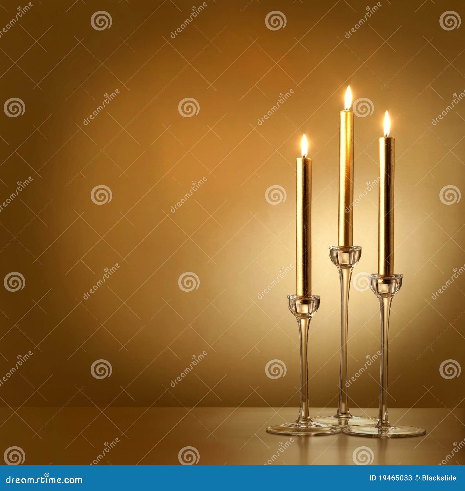 Three gold candles stock image. Image of warm, style - 19465033