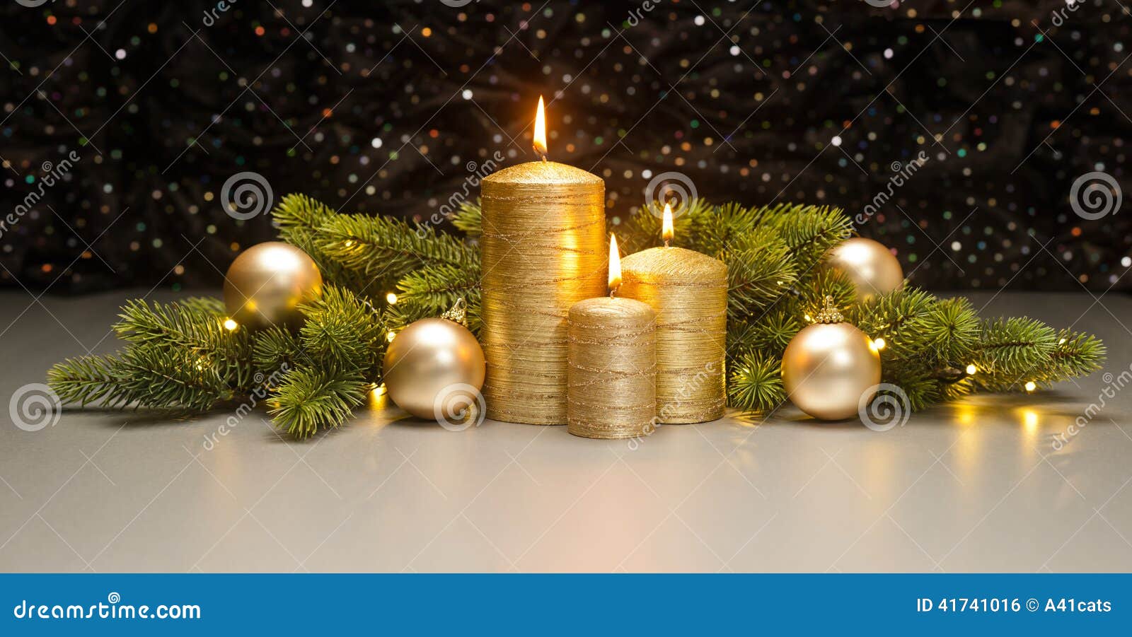 Three golden Candles stock photo. Image of iridescent - 41741016