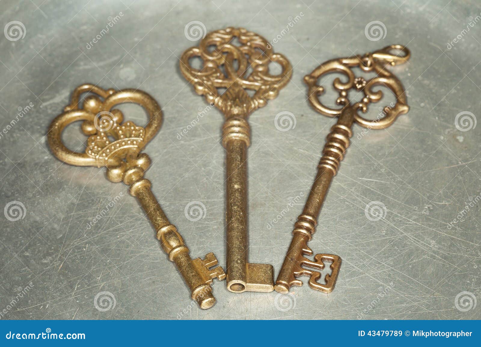 Three Golden Keys on Iron Plate Stock Image - Image of ornate, open ...