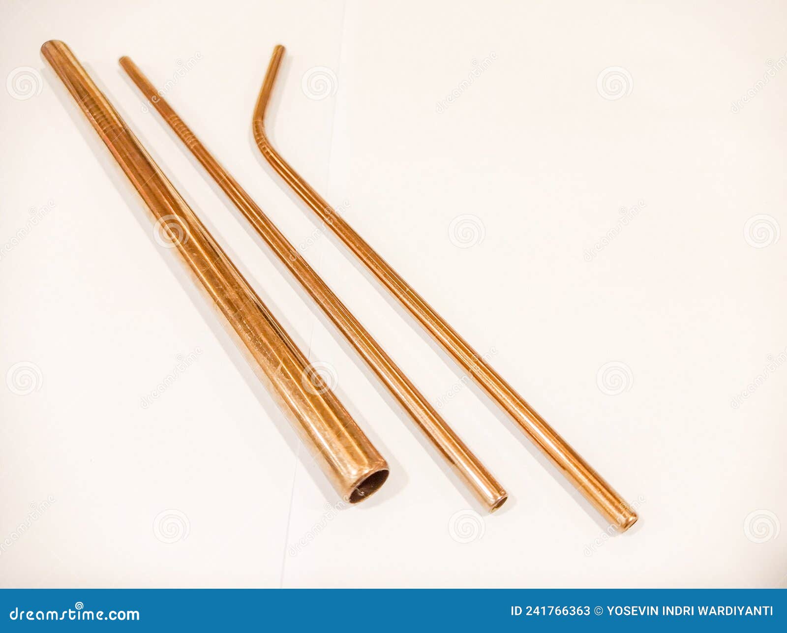 Three Golden Straws of Various Shapes and Sizes Stock Image - Image of ...