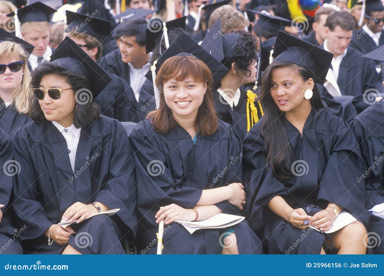 Three Graduates Smiling during Their Ceremony Editorial Photo - Image ...
