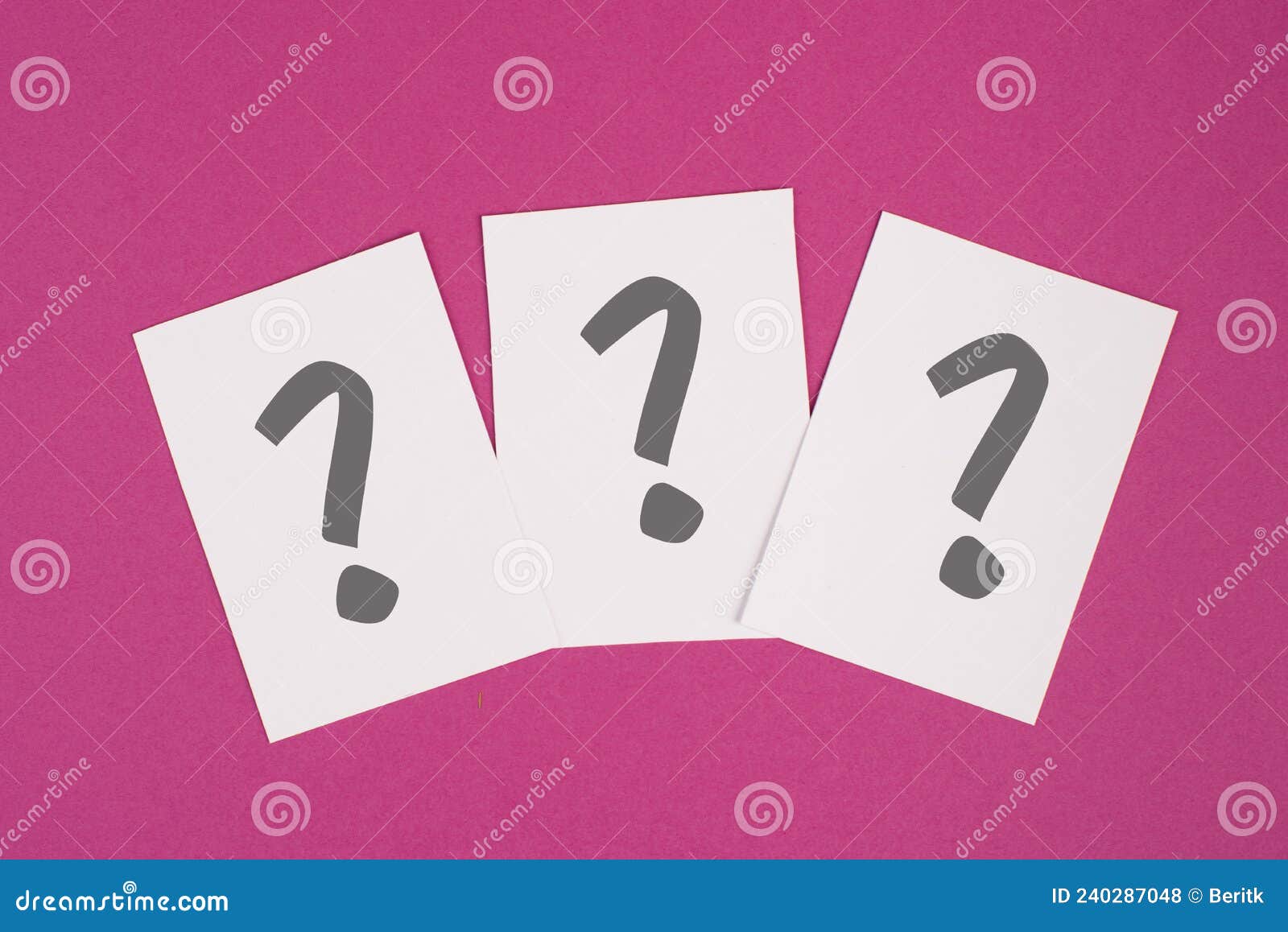 Three Gray Colored Question Marks on Paper, Pink Background, Looking ...