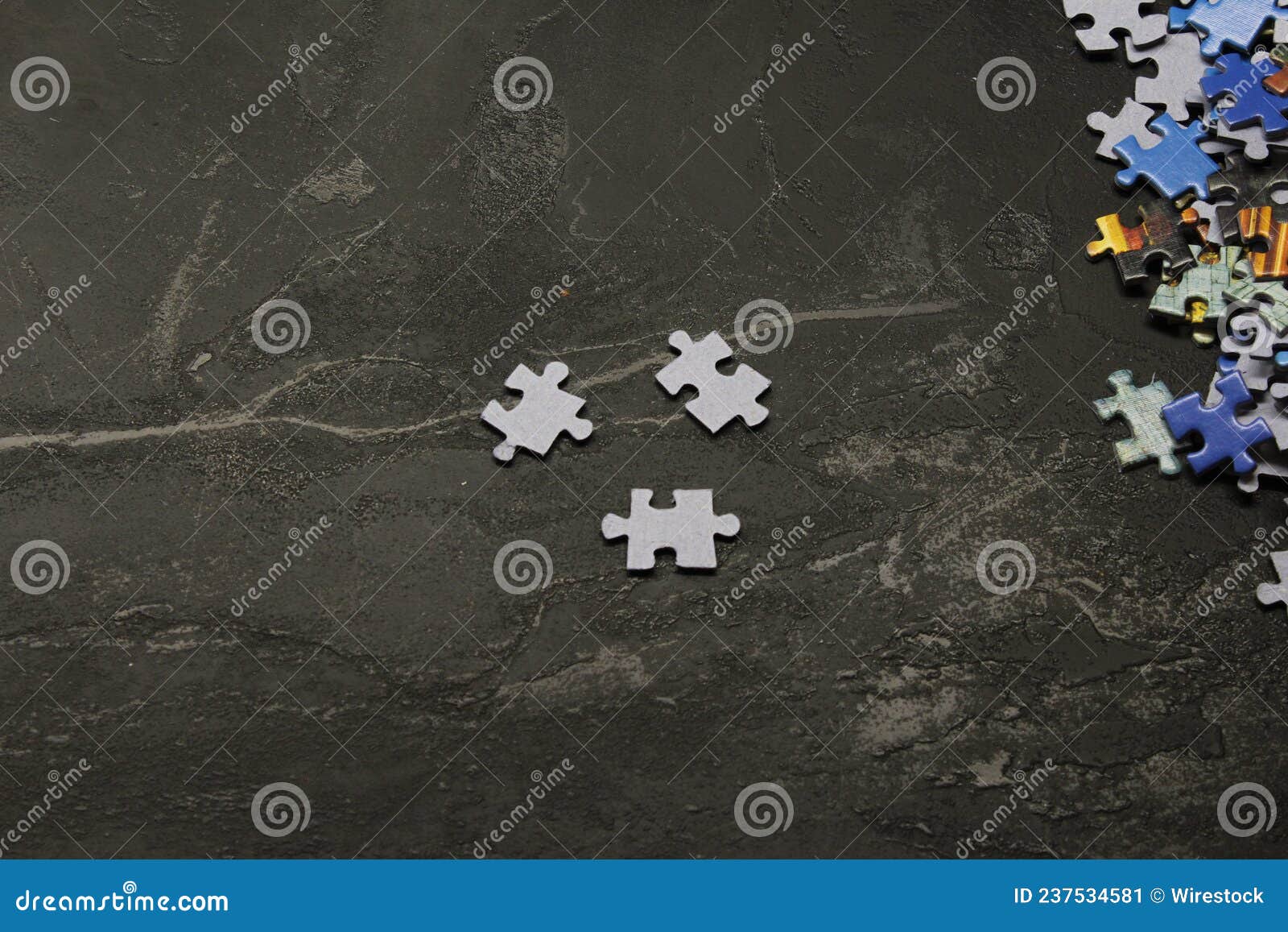 Three Gray Puzzle Pieces on a Black Surface Stock Image - Image of ...