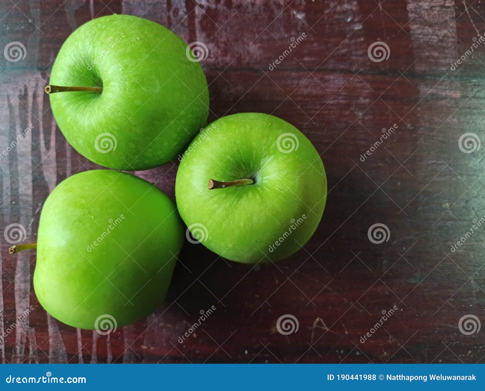 Three Green Apples Placed on the Table. Stock Photo - Image of ...