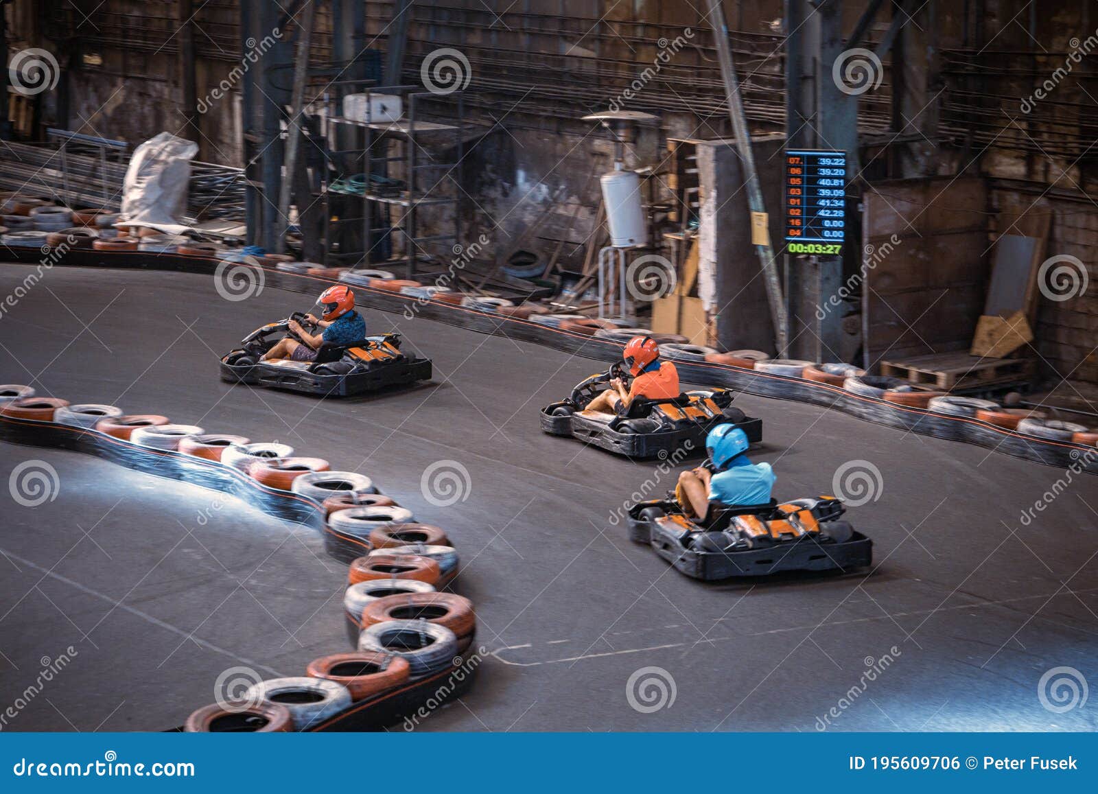 Three Guys Racing with Go Karts Indoors Editorial Photo - Image of guys ...