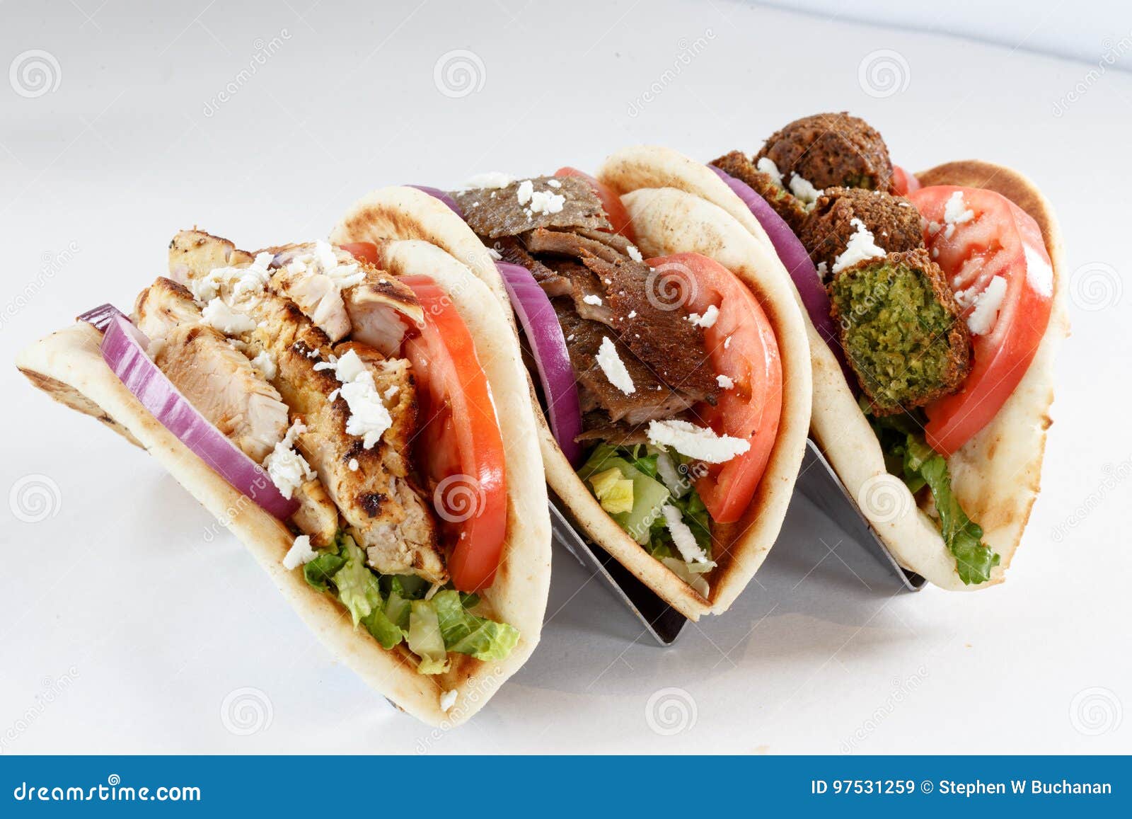 Three gyros stock image. Image of falafel, pita, sauce - 97531259