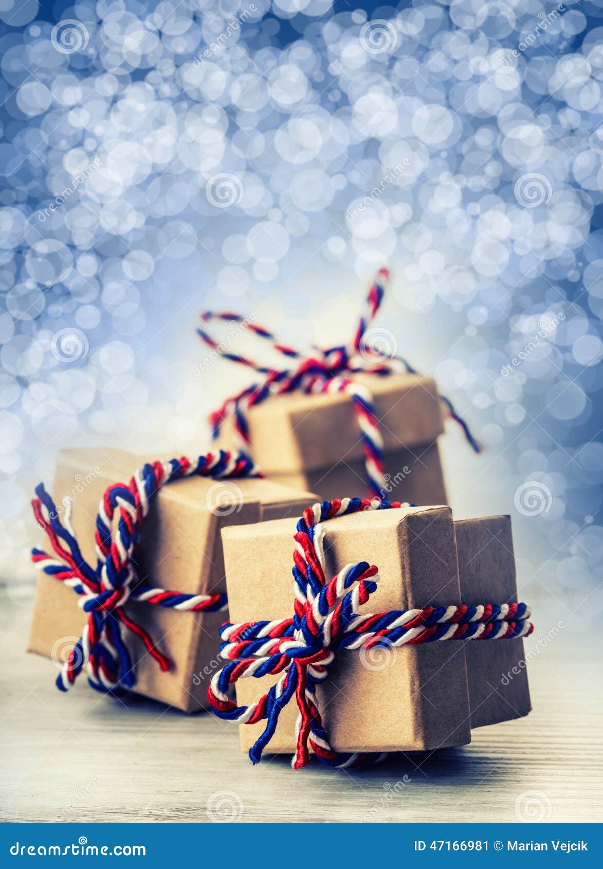 Three Handmade Gift Boxes in Shiny Colour Background. Stock Image ...