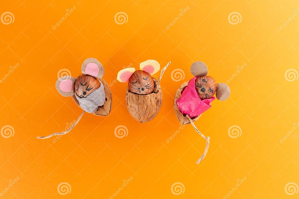 Three Handmade Mice Crafts Made from Hazelnuts and Paper, Arranged on ...