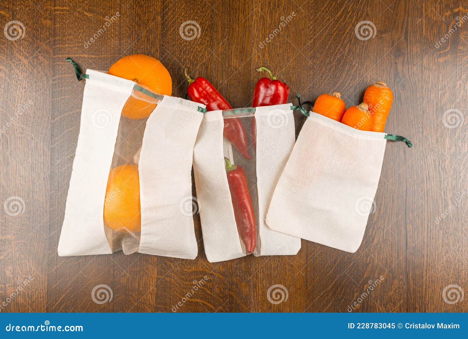 Three Handmade Reusable Sacks with Some Vegetables in Them. Stock Image ...