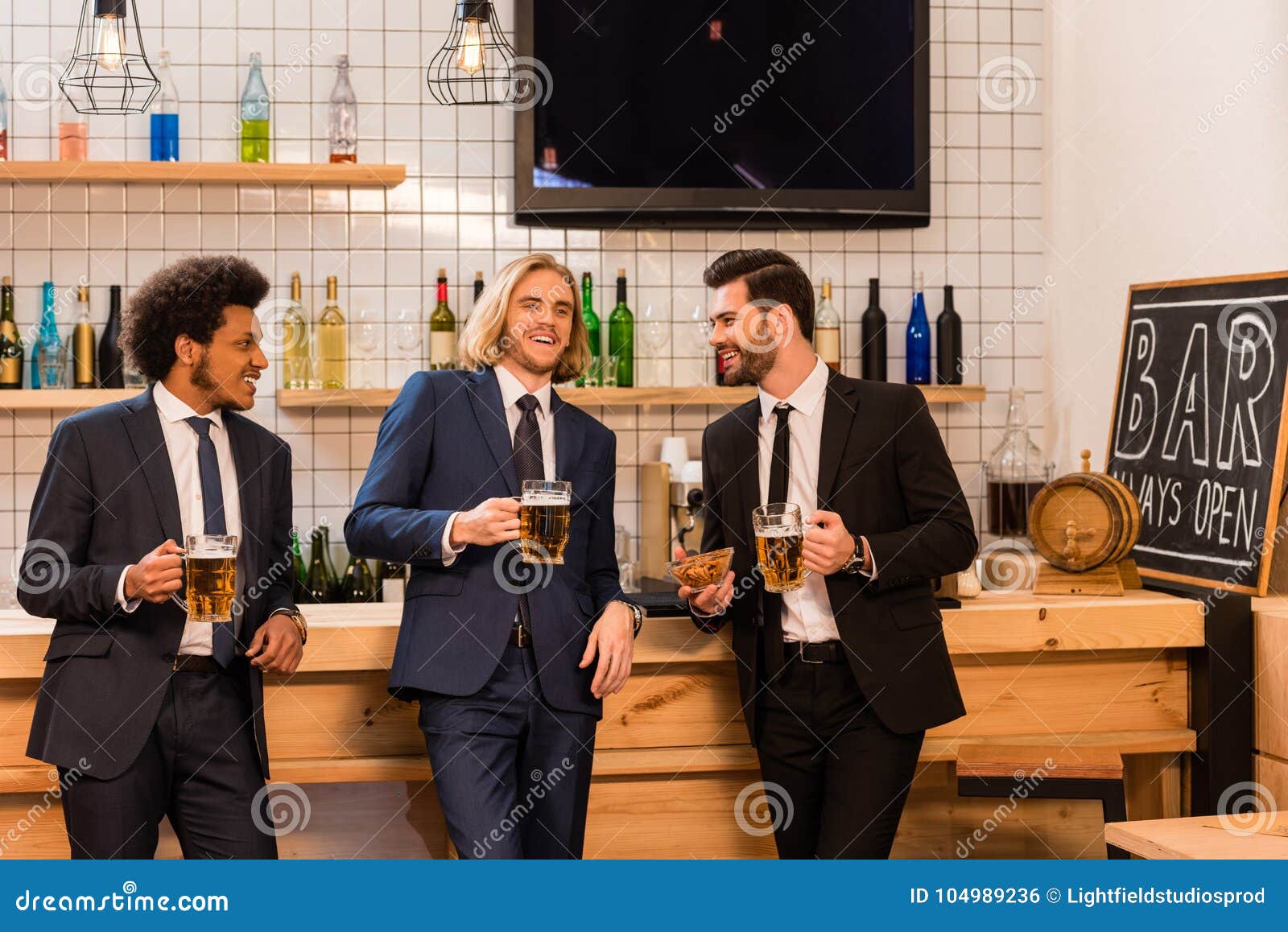 Businessmen Drinking Beer in Bar Stock Photo - Image of friendship ...