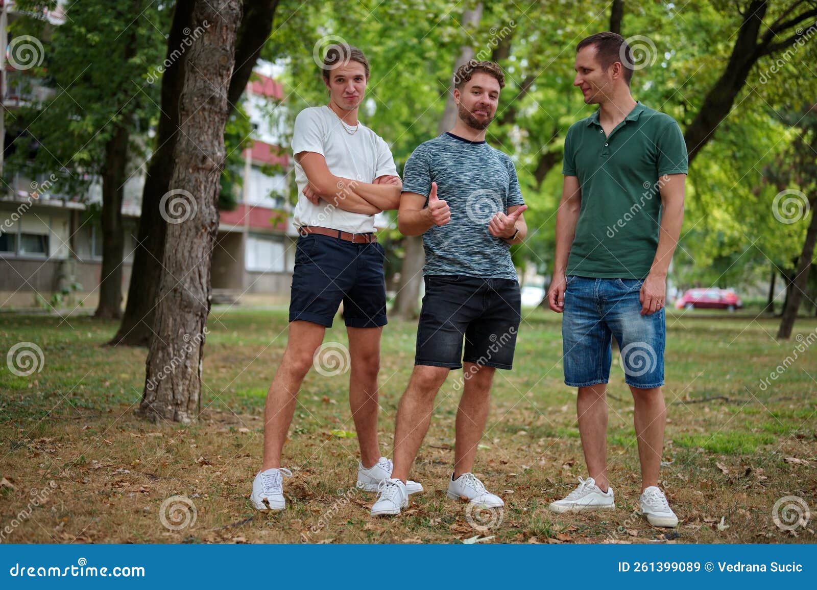 Handsome Young Men Having Fun Stock Image - Image of green, building ...
