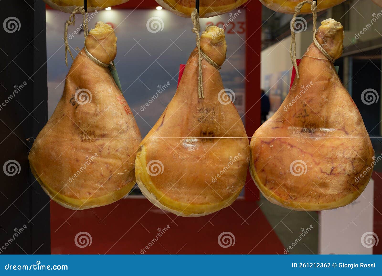 Three Hanging Whole Raw Hams Stock Photo - Image of grocery, black ...