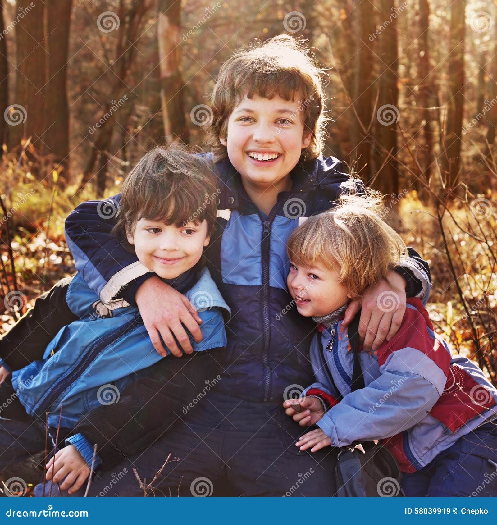 Three happy boys stock image. Image of group, childhood - 58039919