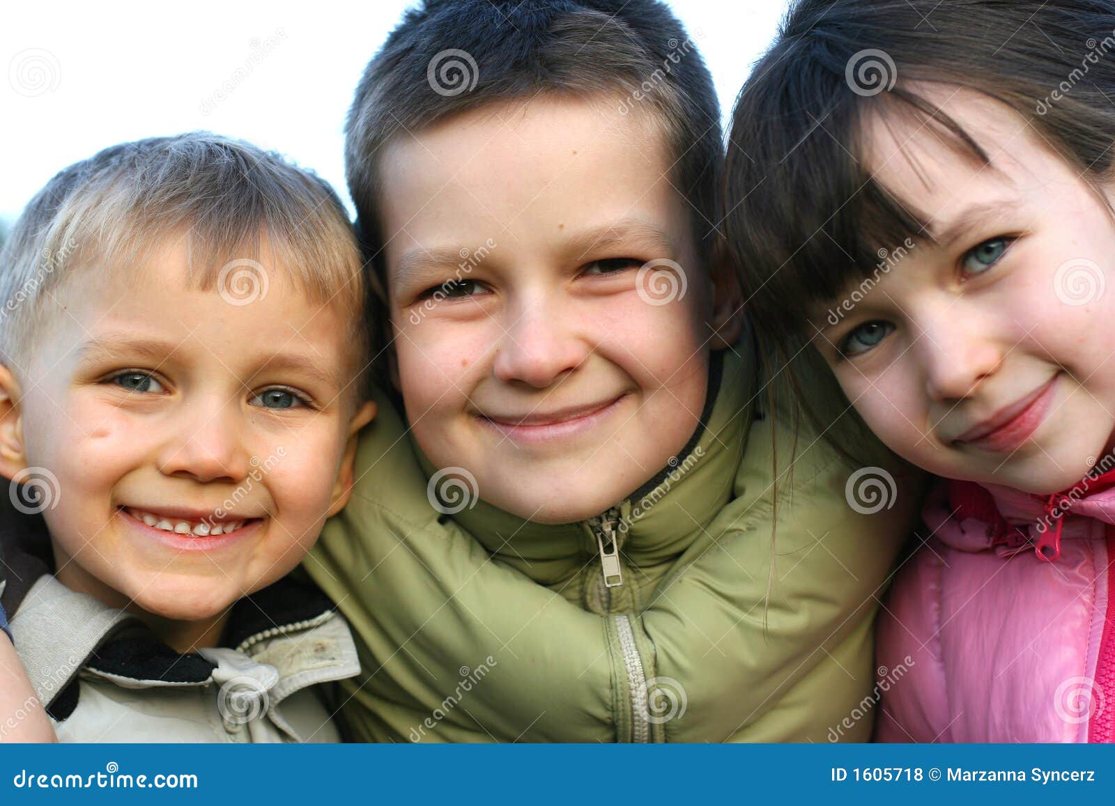 Three Happy Children stock photo. Image of grinning, amiably - 1605718