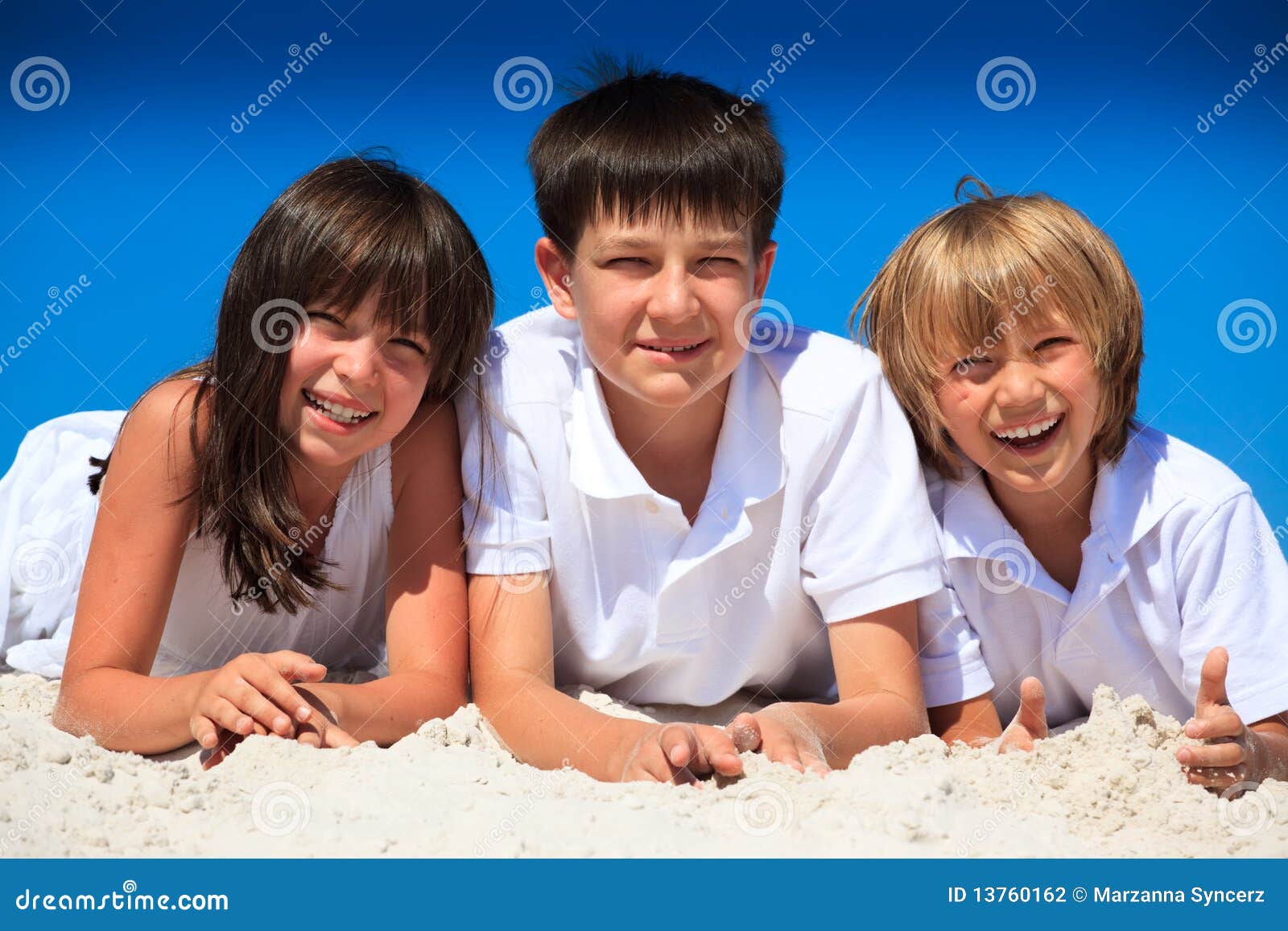Three Happy Children on Beach Stock Photo - Image of brothers, female ...