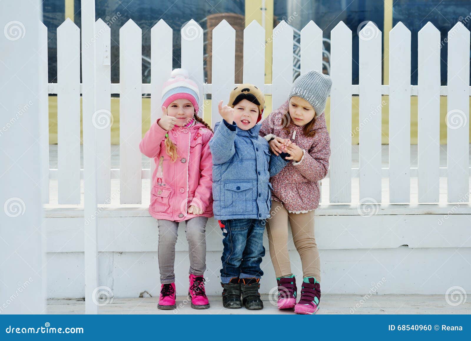 Three happy children stock photo. Image of friendship - 68540960