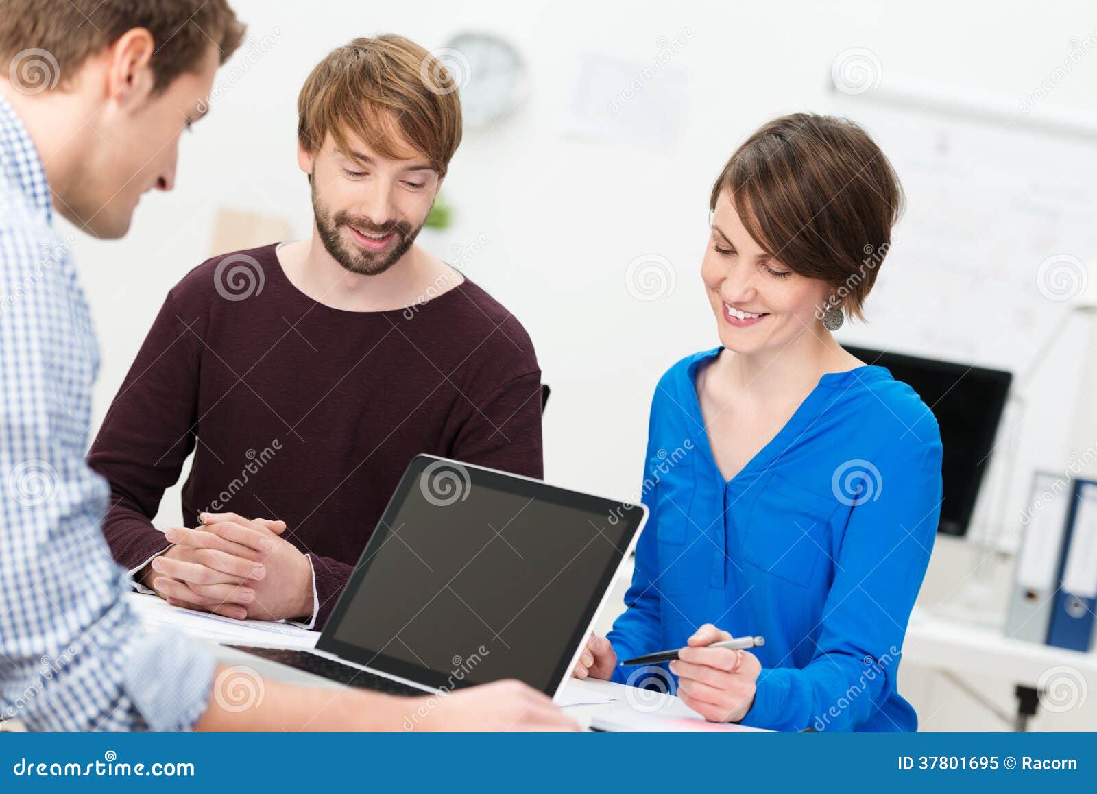 Three Happy Co-workers in a Meeting Stock Image - Image of casual ...