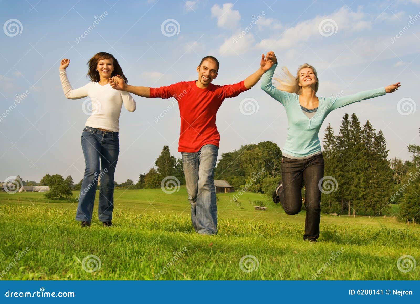 Three happy friends stock image. Image of meadow, arms - 6280141