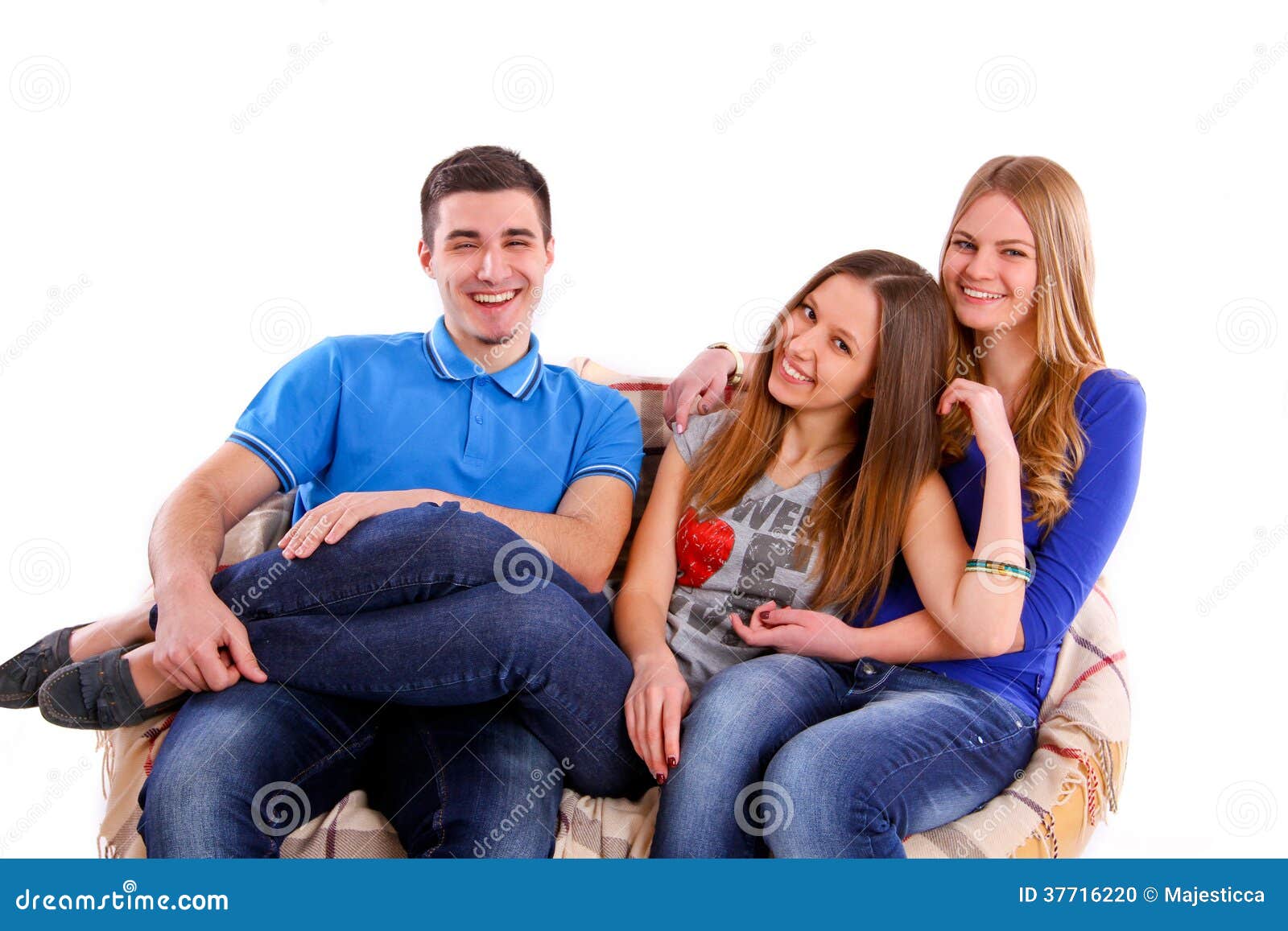 Three Happy Friends Sitting on a Couch Isolated Stock Photo - Image of ...