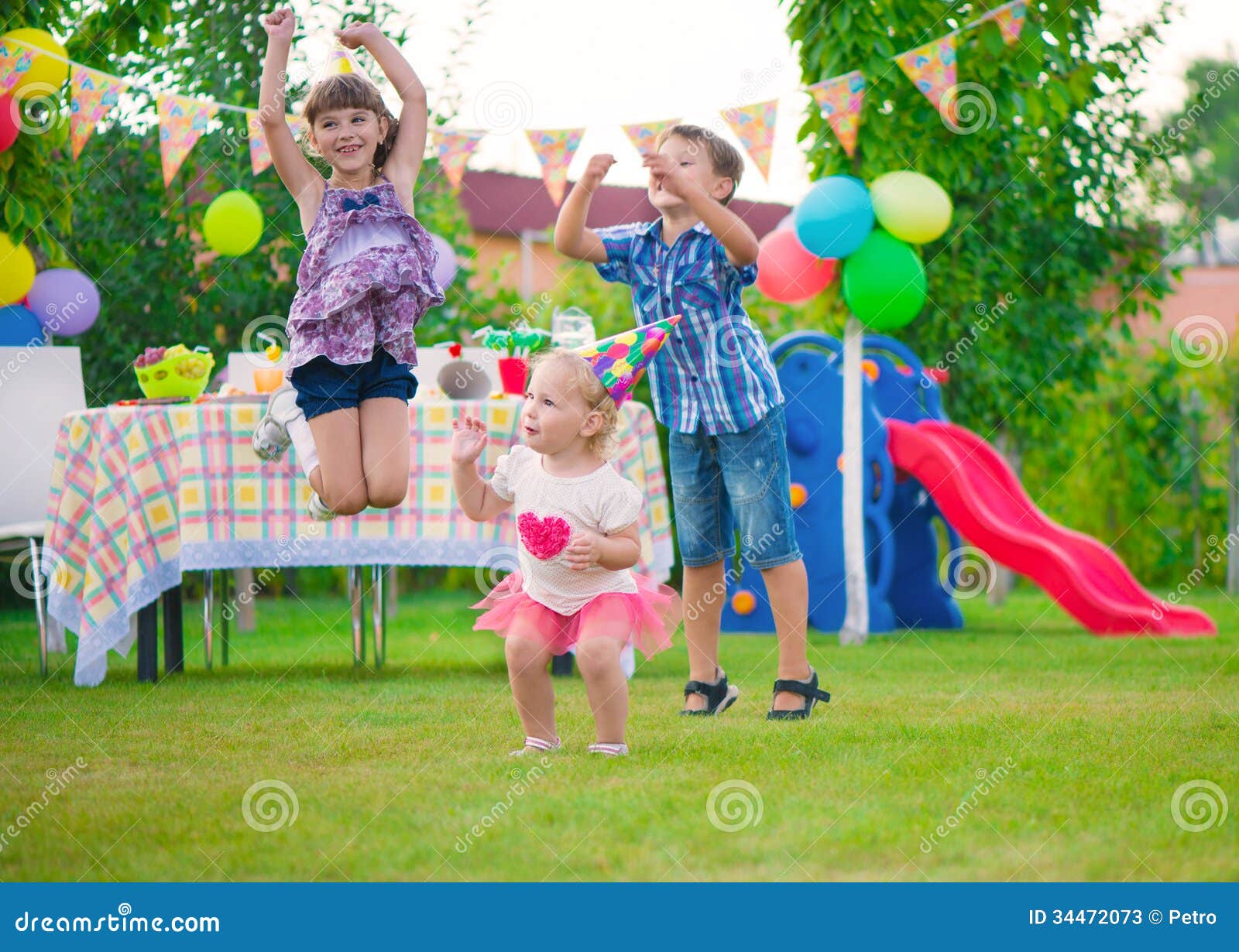 Three happy kids dancing stock image. Image of girl, celebrating - 34472073