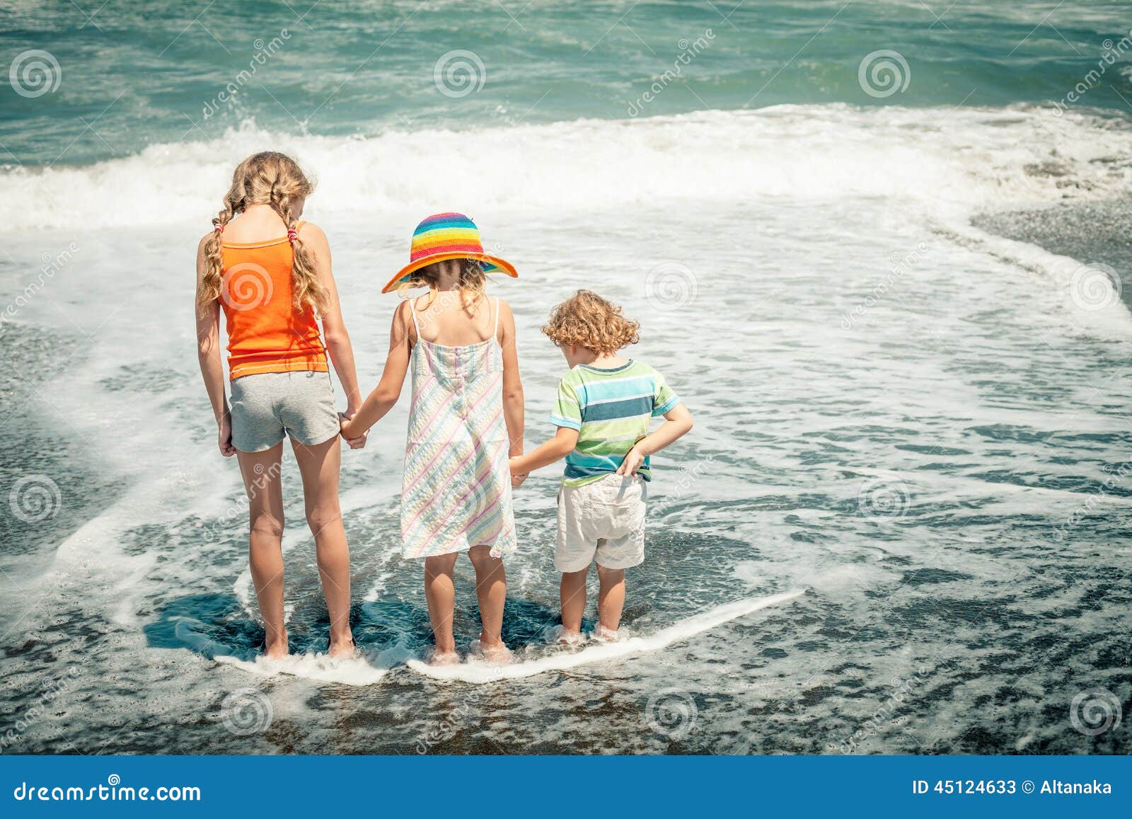 Three Happy Kids Playing on Beach Stock Image - Image of healthy ...