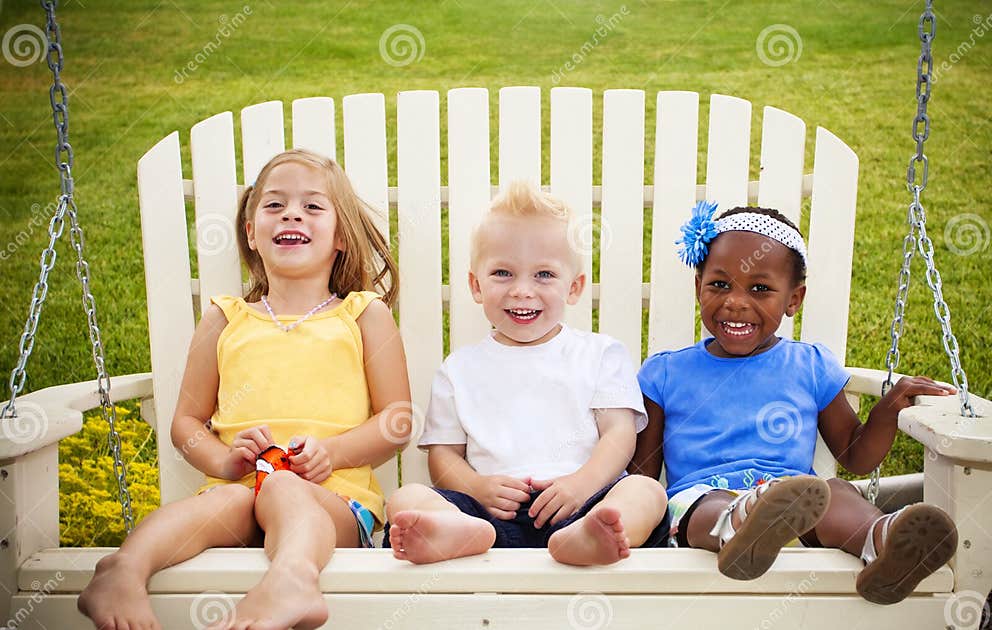 Three Happy Little Kids stock image. Image of play, happiness - 20310535