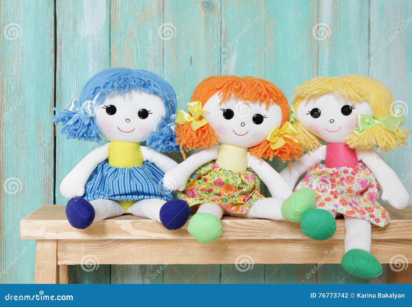 Three Happy Rag Dolls on Wooden Background Stock Photo - Image of ...