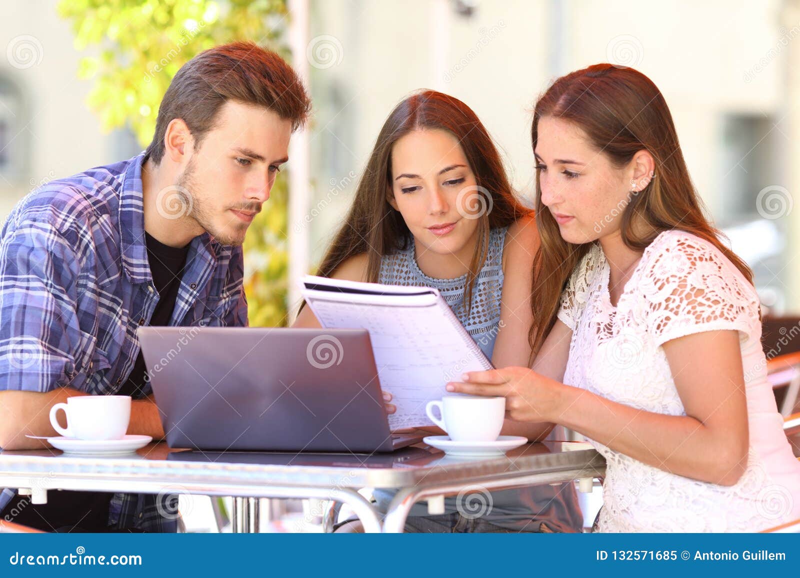 Three Students Learning Together in a Coffee Shop Stock Image - Image ...