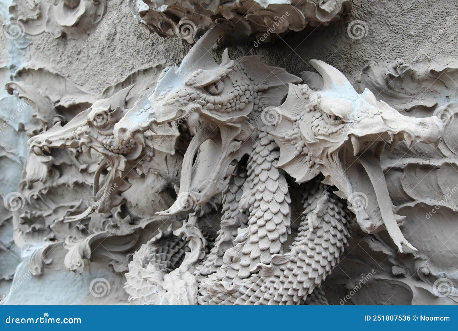 Cement Statue on Concrete Wall Stock Photo - Image of ancient, three ...