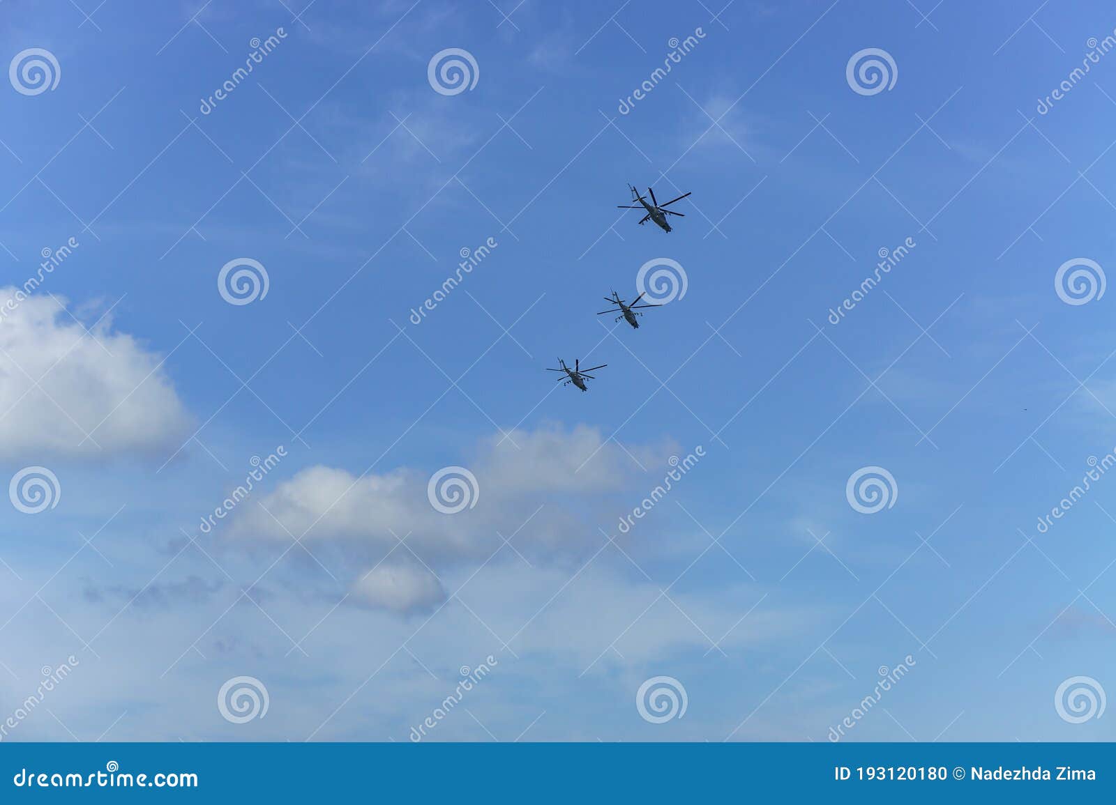 Three Helicopters in the Sky, Military Helicopters in a Cloudless Sky ...